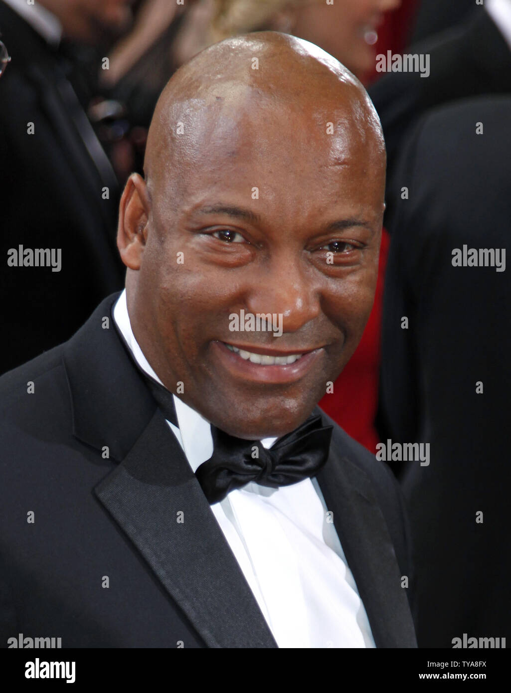 John Singleton arrives on the red carpet at the 82nd Academy Awards in ...
