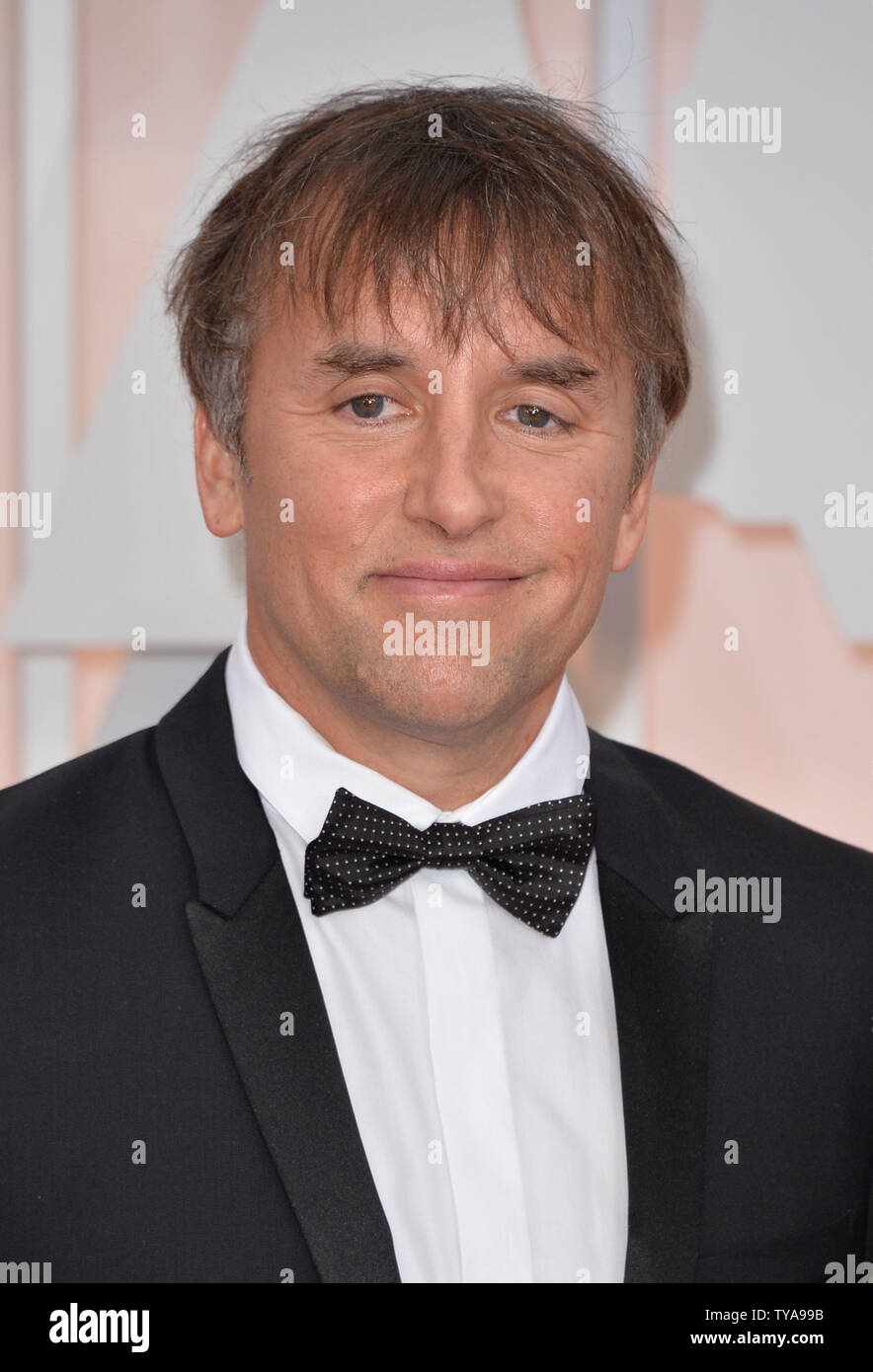 Richard Linklater arrives on the red carpet at the 87th Academy Awards ...