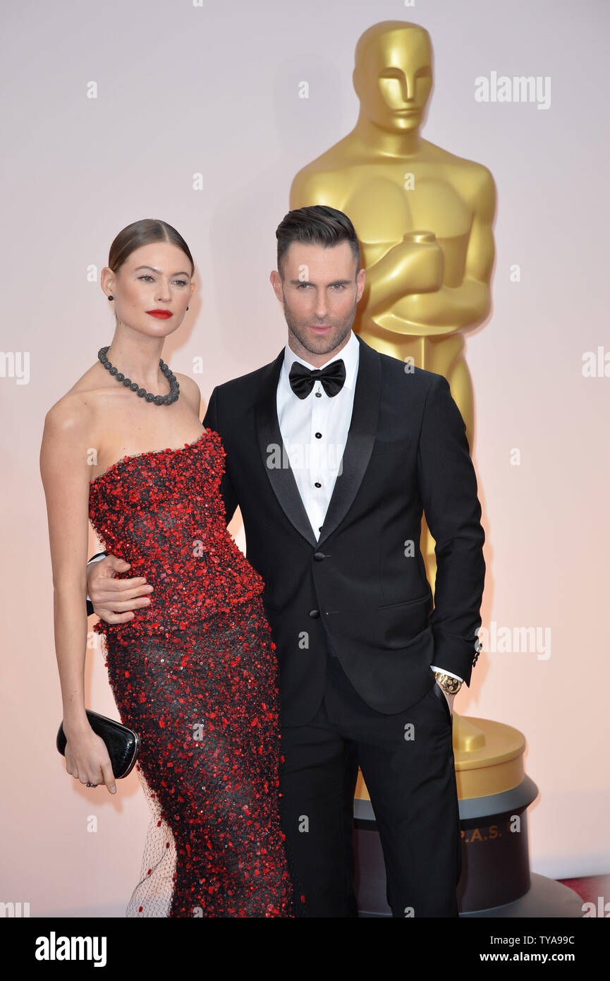 Adam Levine of Maroon 5 and his wife Behati Prinsloo arrive on the red ...
