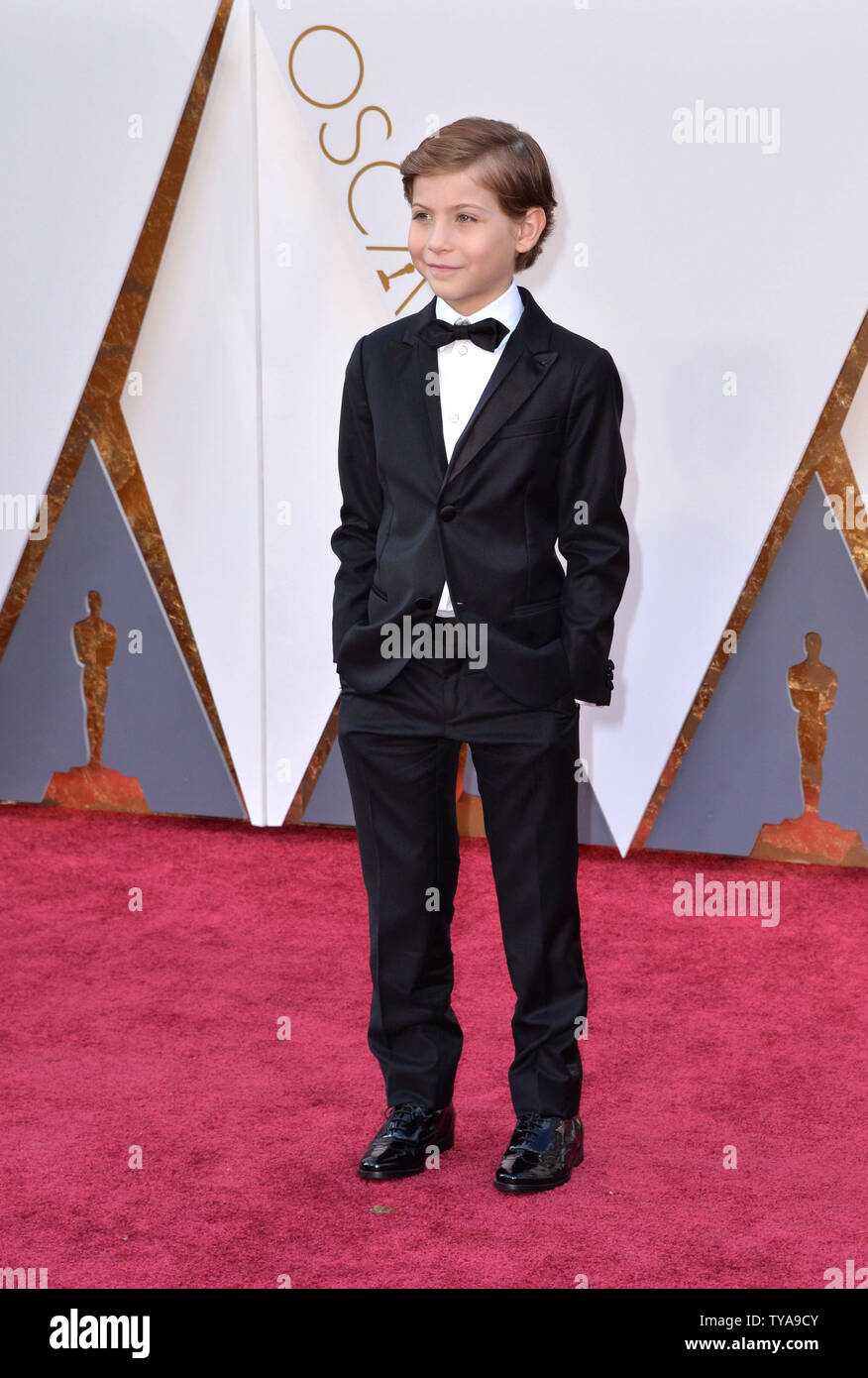 Jacob Tremblay arrives on the red carpet during the 88th Academy Awards ...