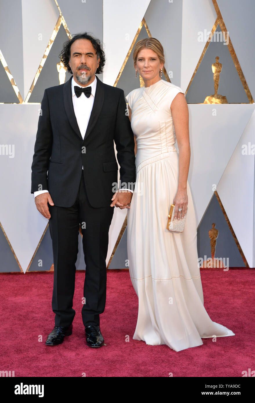 Filmmaker Alejandro Gonzalez Inarritu (L) and Maria Eladia Hagerman ...