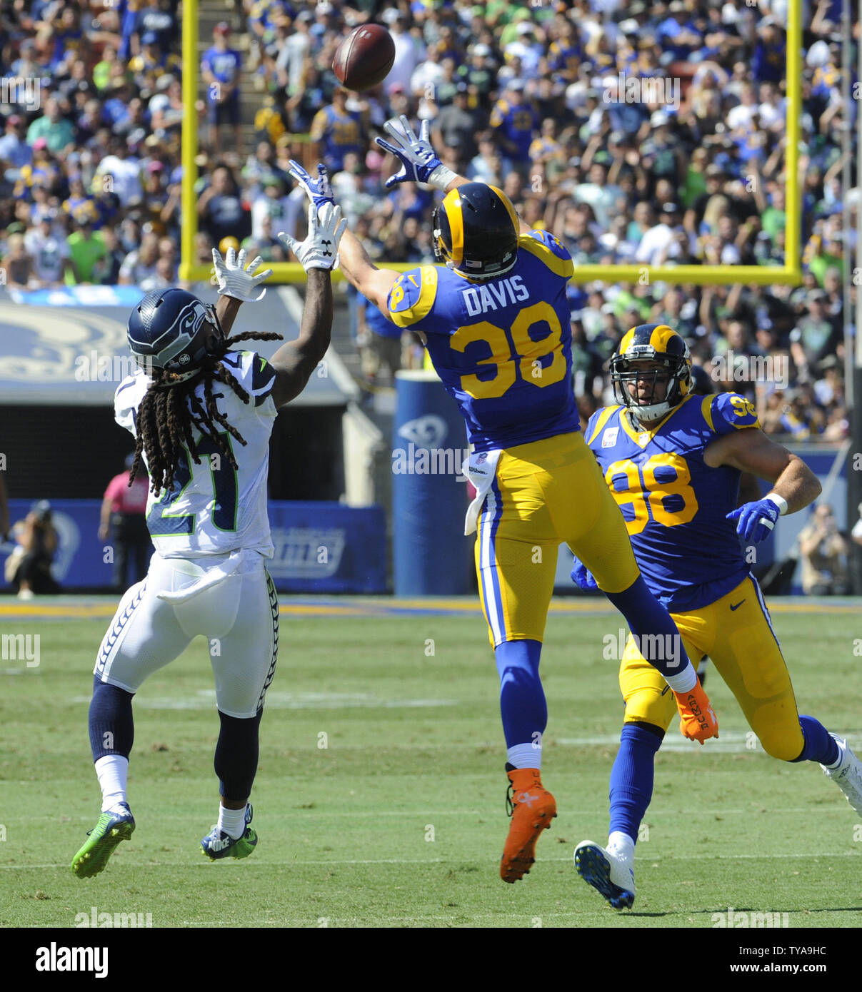 Los Angeles Rams safety Cody Davis intercepts a pass to Seattle ...