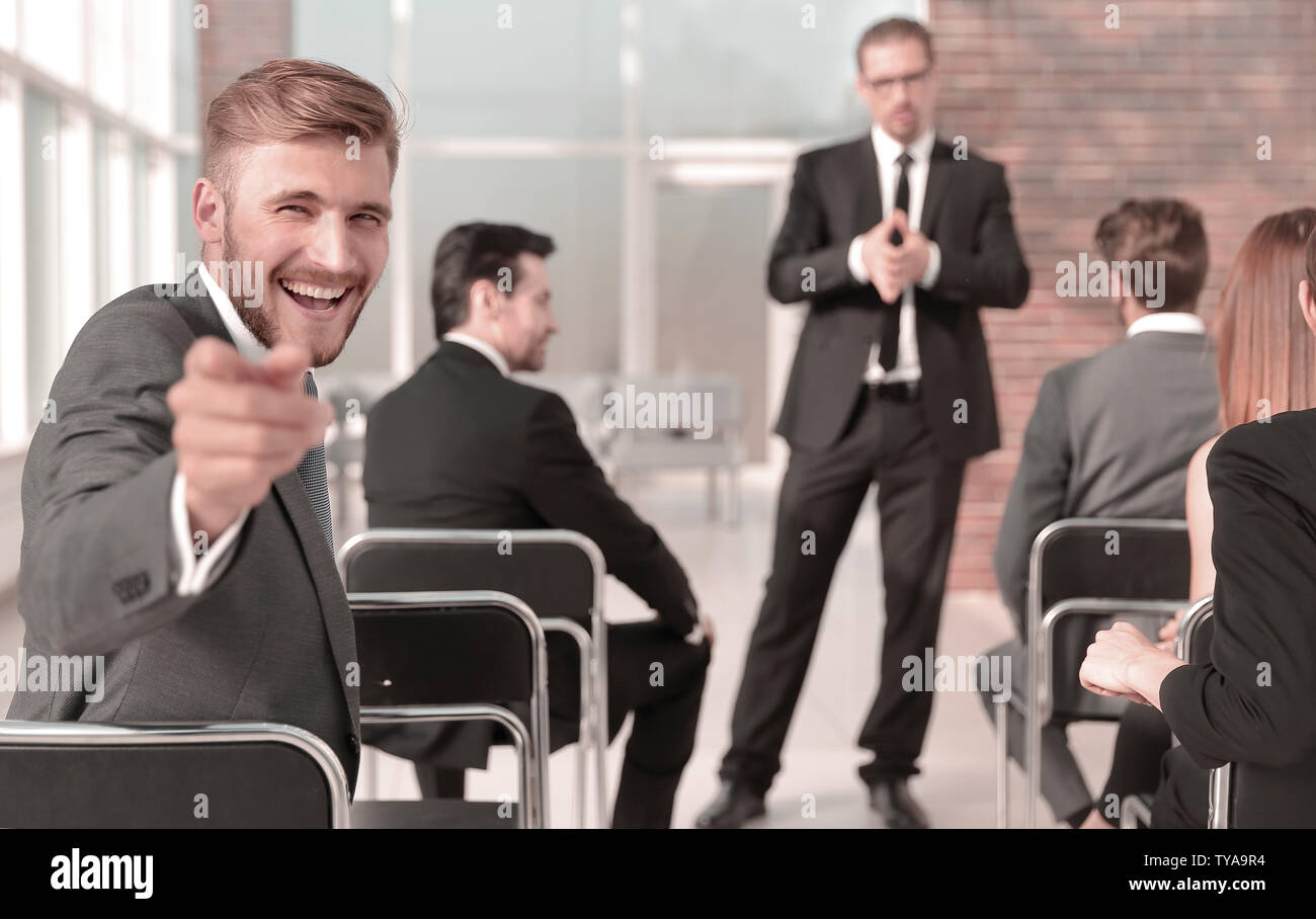 Seated man turning hi-res stock photography and images - Alamy