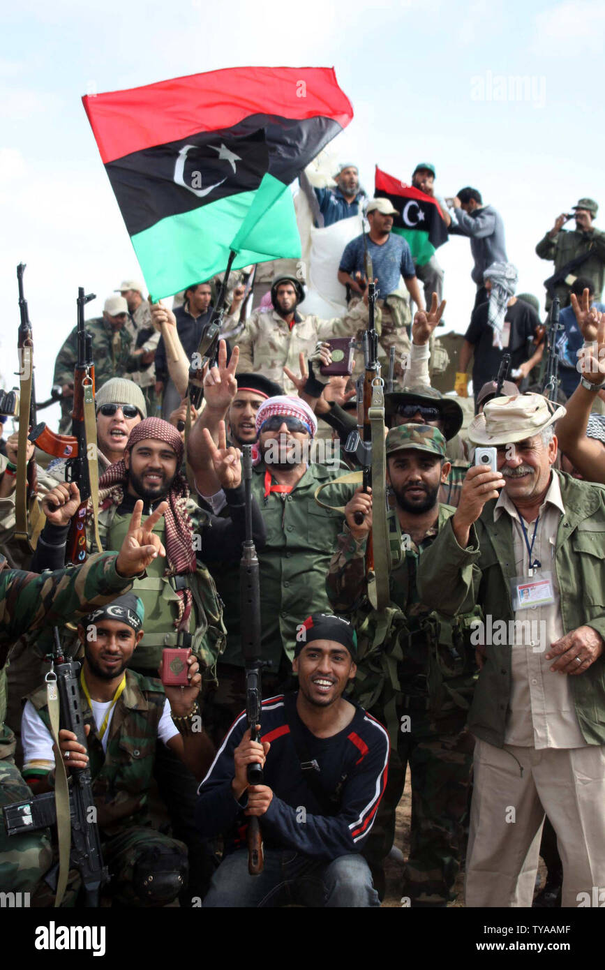 Libyan National Transitional Council (NTC) fighters arrive in Benghazi ...