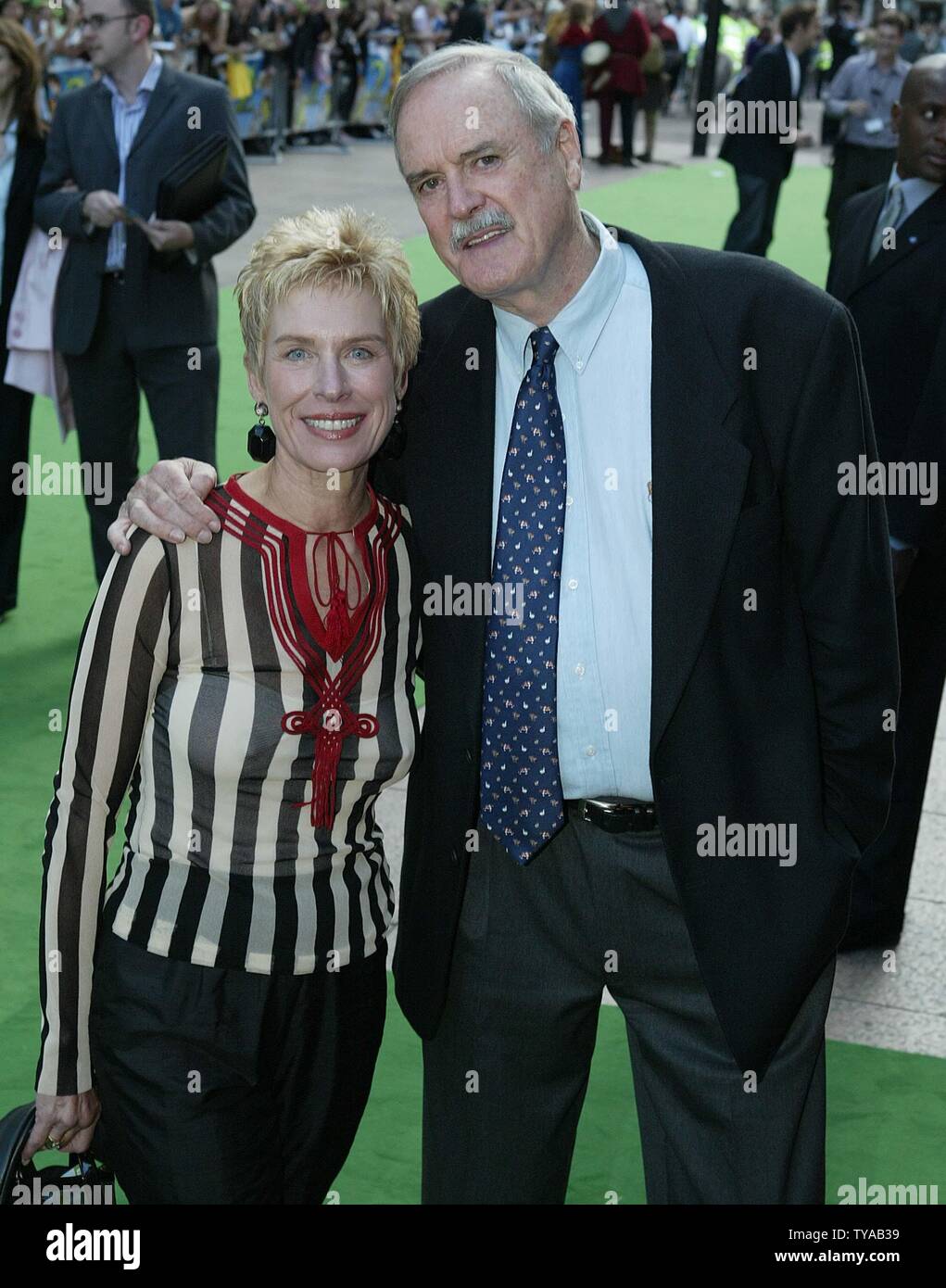 British actor John Cleese (R) and his wife at the European premiere of ...