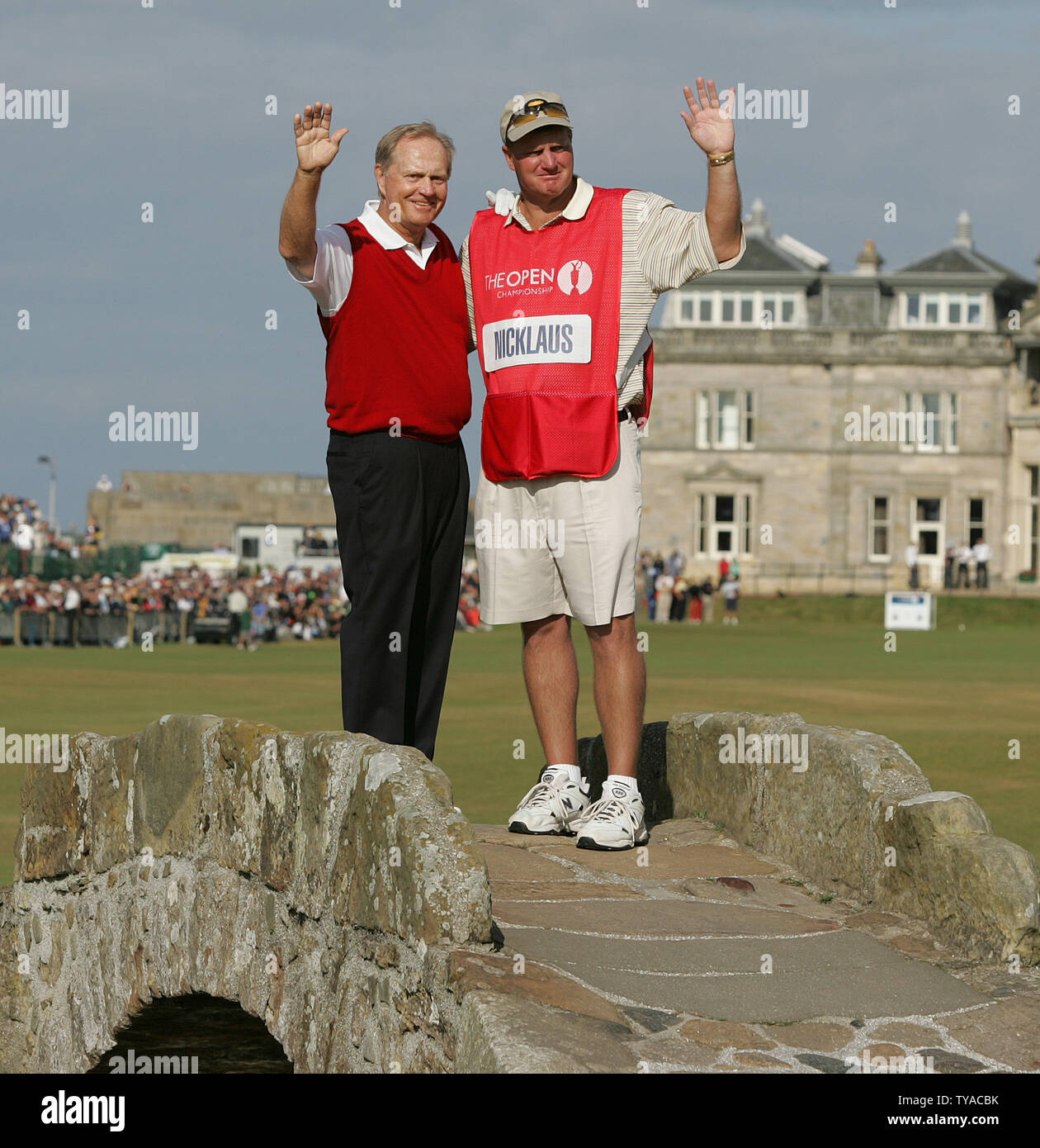 American golfer Jack Nicklaus and his son Stephen, his caddie, wave an ...