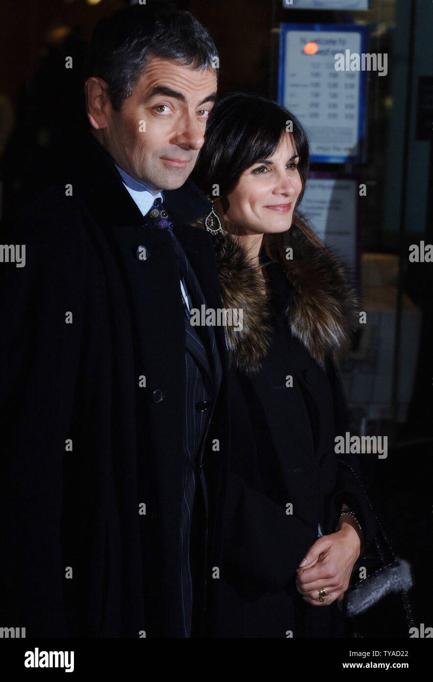 British actor Rowan Atkinson and Sunetra Sastry attend the British ...