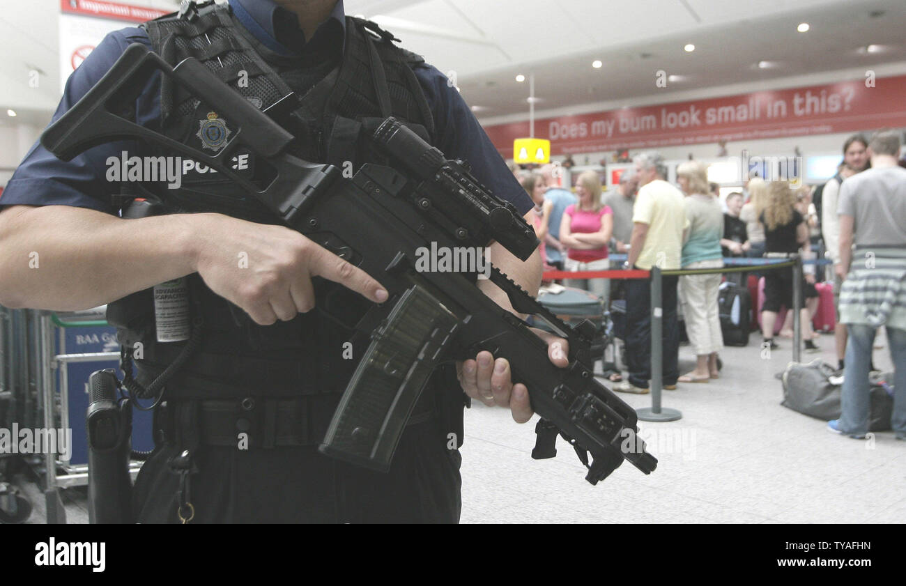 Armed police gatwick airport following hi-res stock photography and ...