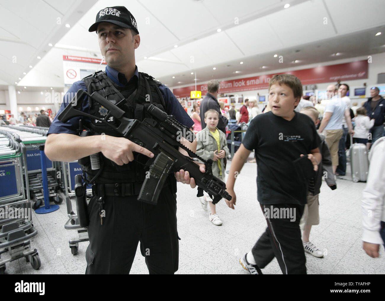 Armed police gatwick airport following hi-res stock photography and ...