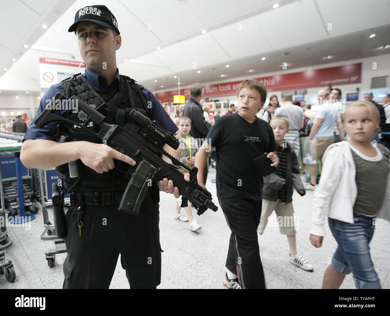 Armed police gatwick airport following hi-res stock photography and ...