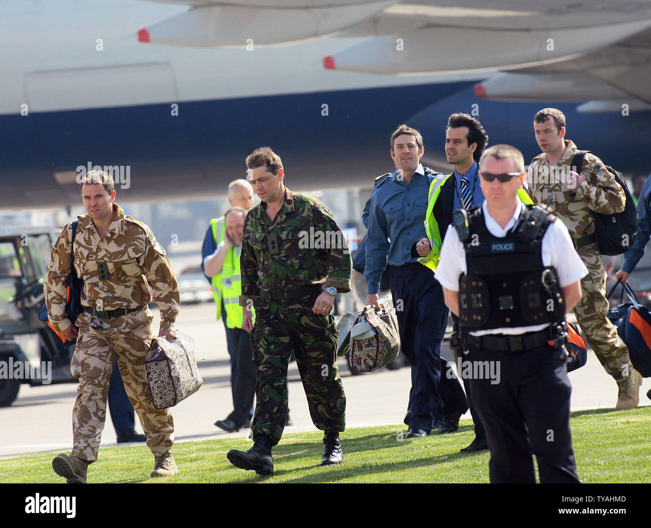 Members of the British army and Royal Navy arrive back in London, after ...