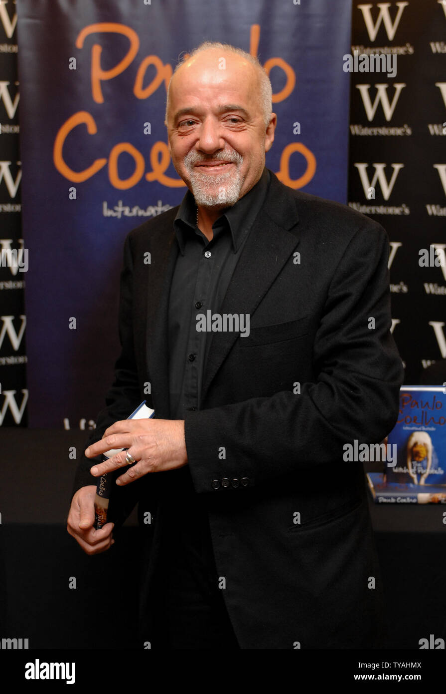 Brazilian author Paulo Coelho attends a signing of his novel "The Witch ...