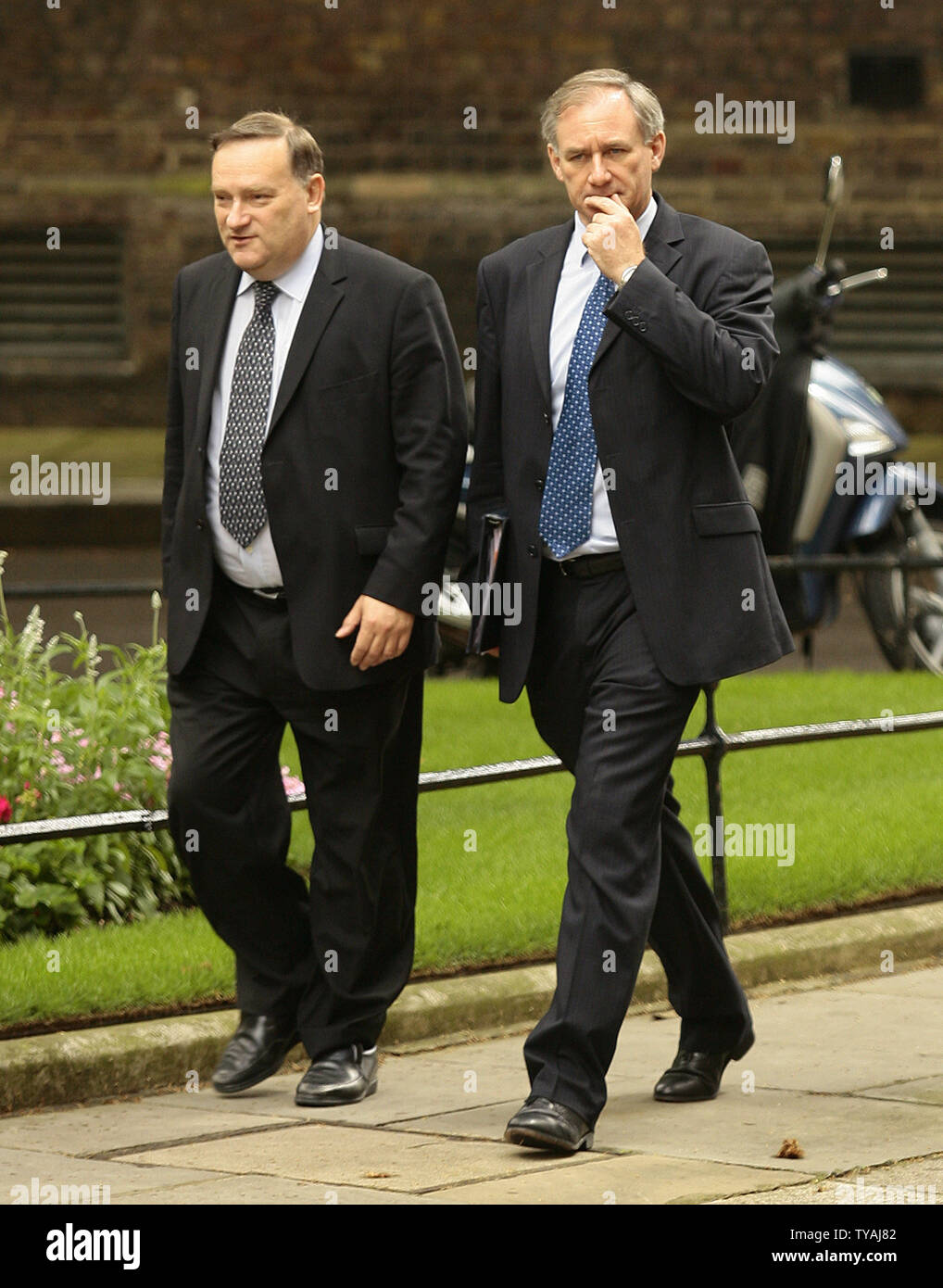 Members of Parliament Nick Brown (L) and Chief Whip Geoff Hoon arrive ...