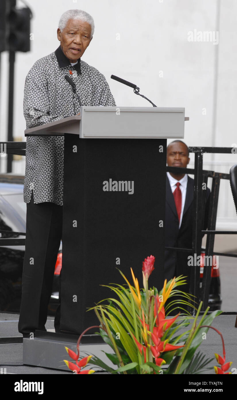Nelson Mandela speaks at the unveiling of a nine foot bronze statue of ...