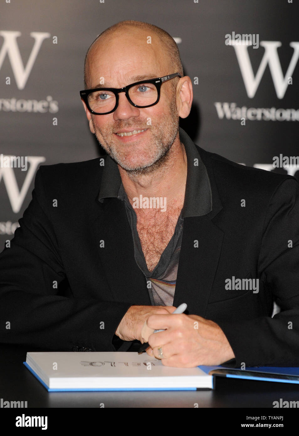 American singer Michael Stipe from R.E.M attends a signing of his and ...