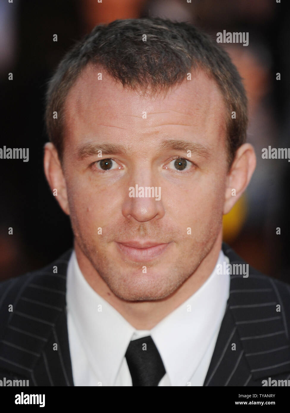 British director Guy Ritchie attends the world premiere of "Rocknrolla ...