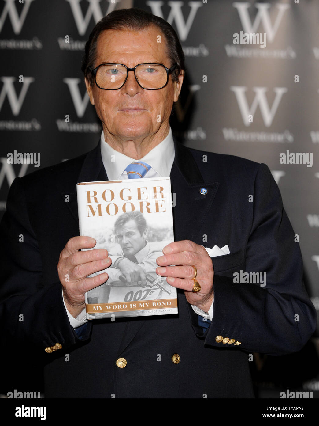 British actor Roger Moore attends a signing of his autobiography "My ...