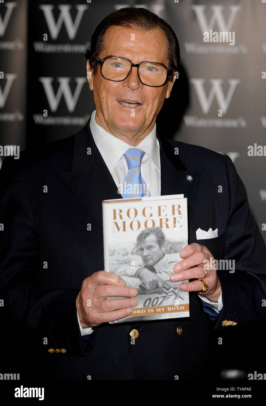 British actor Roger Moore attends a signing of his autobiography "My ...