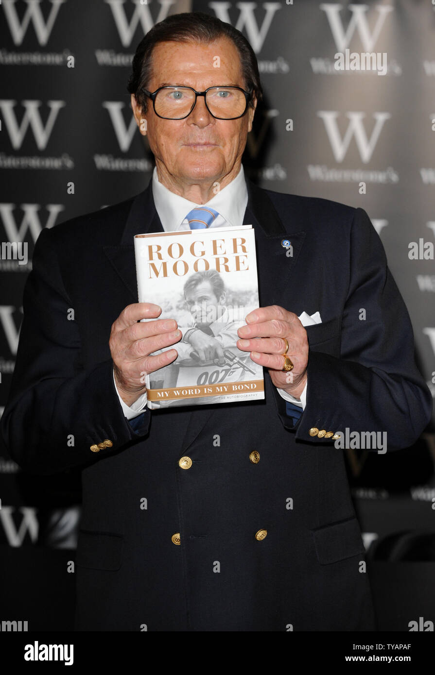 British actor Roger Moore attends a signing of his autobiography "My ...