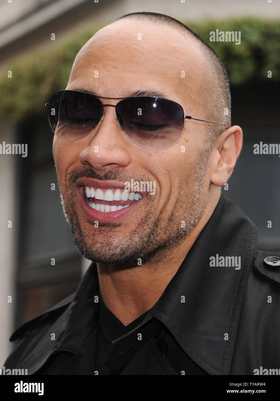 American actor Dwayne Johnson attends the premiere of "Race To Witch ...