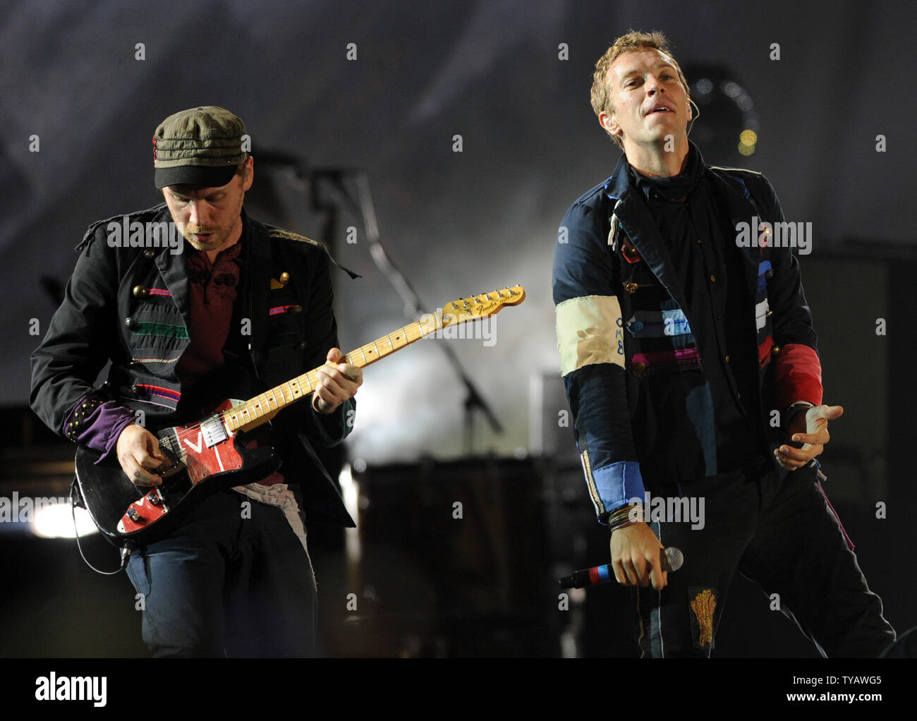 British singer Chris Martin and guitarist Jonny Buckland perform with ...