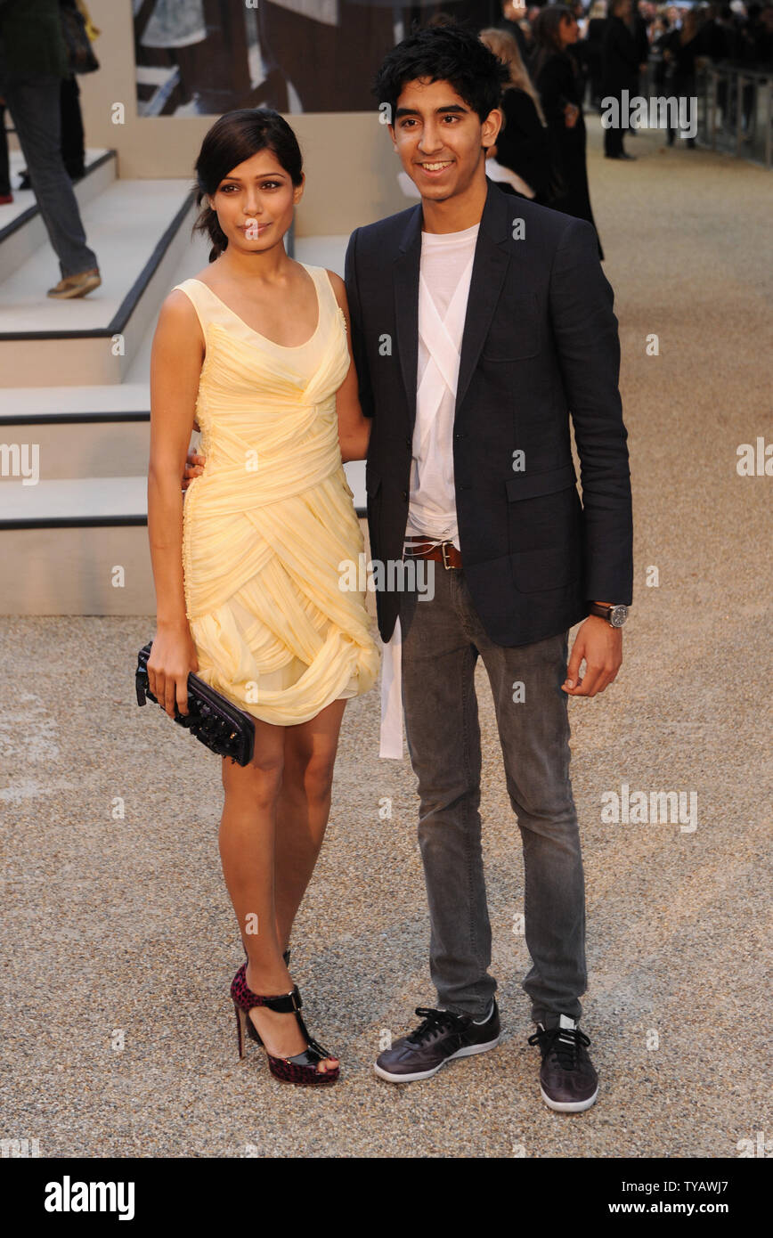 Indian actress Freida Pinto and British actor Dev Patel attend Burberry ...