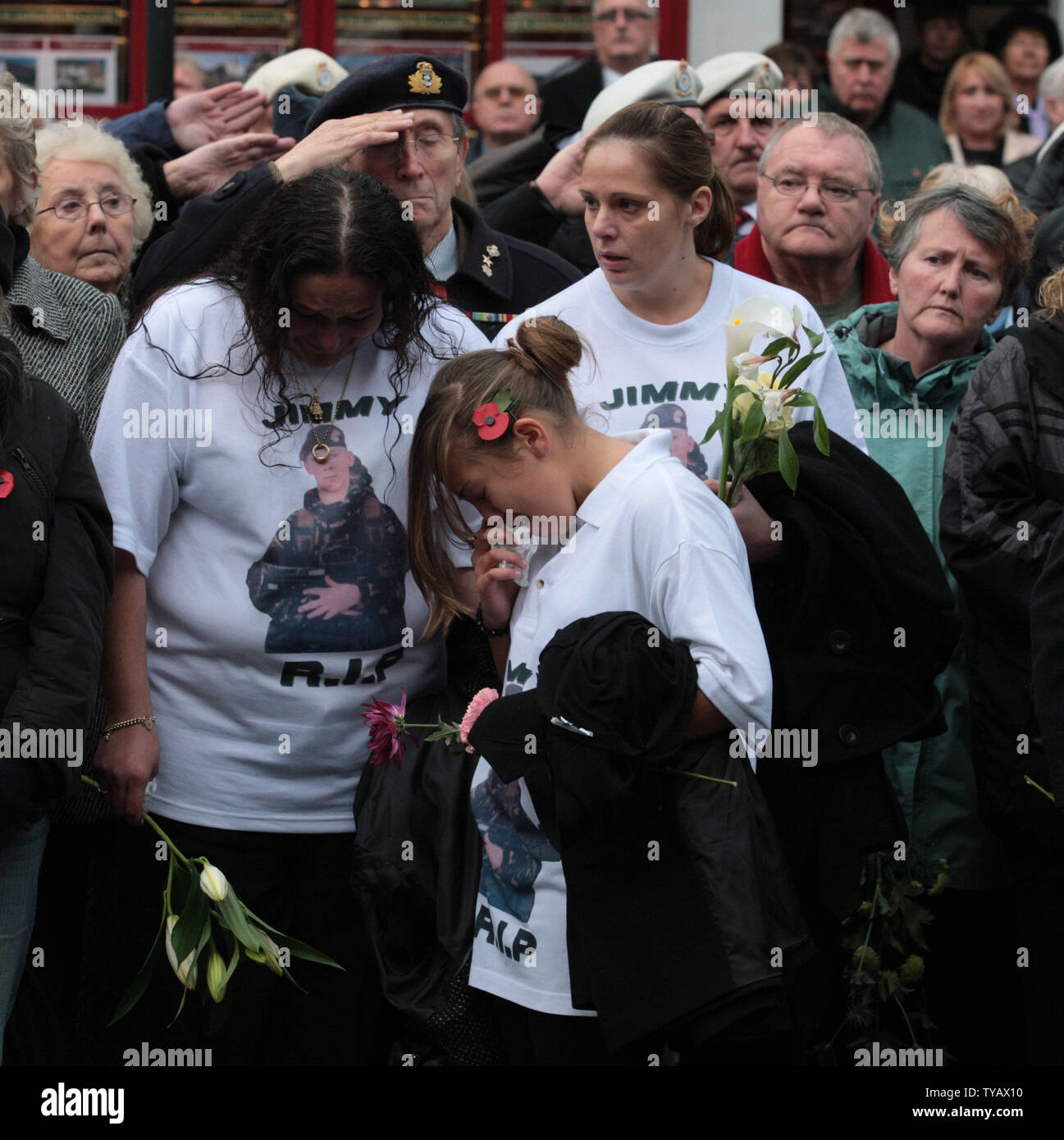 Relatives of dead soldier James Major await his coffin as six British ...