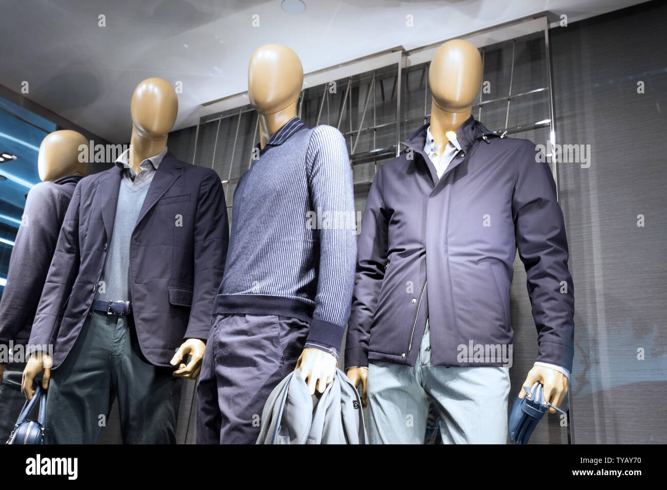 Fashion store mannequins in window Stock Photo - Alamy