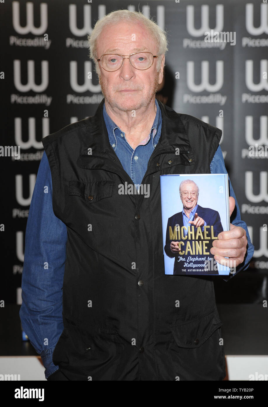 British actor Sir Michael Caine attends a signing of his autobiography ...
