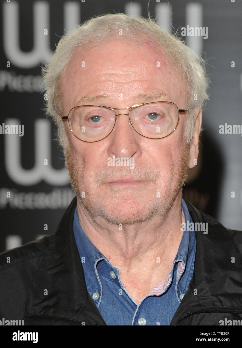 British actor Sir Michael Caine attends a signing of his autobiography ...