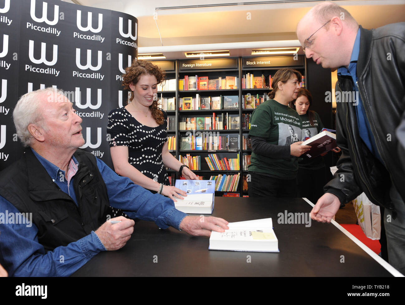British actor Sir Michael Caine attends a signing of his autobiography ...