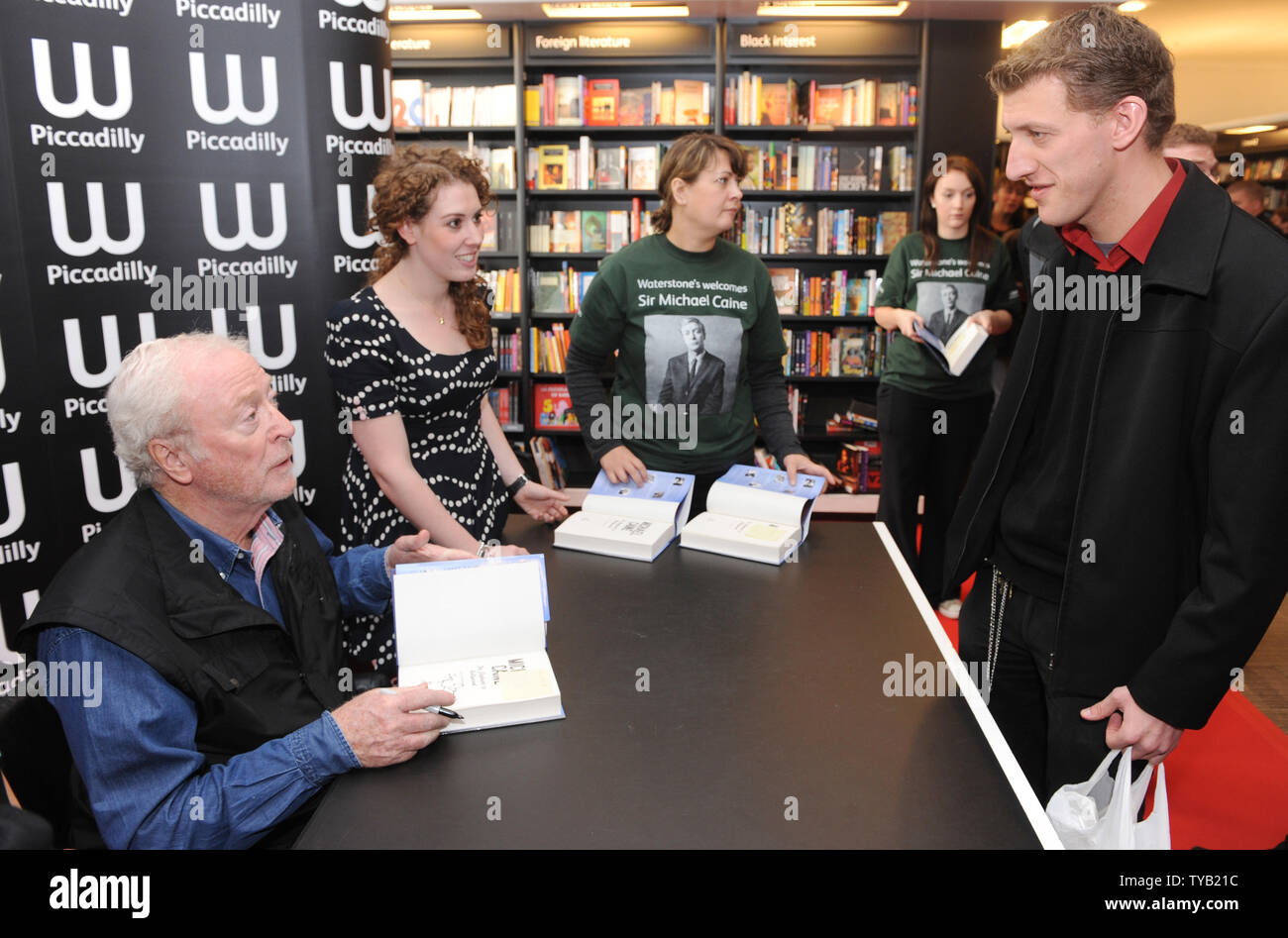 British actor Sir Michael Caine attends a signing of his autobiography ...