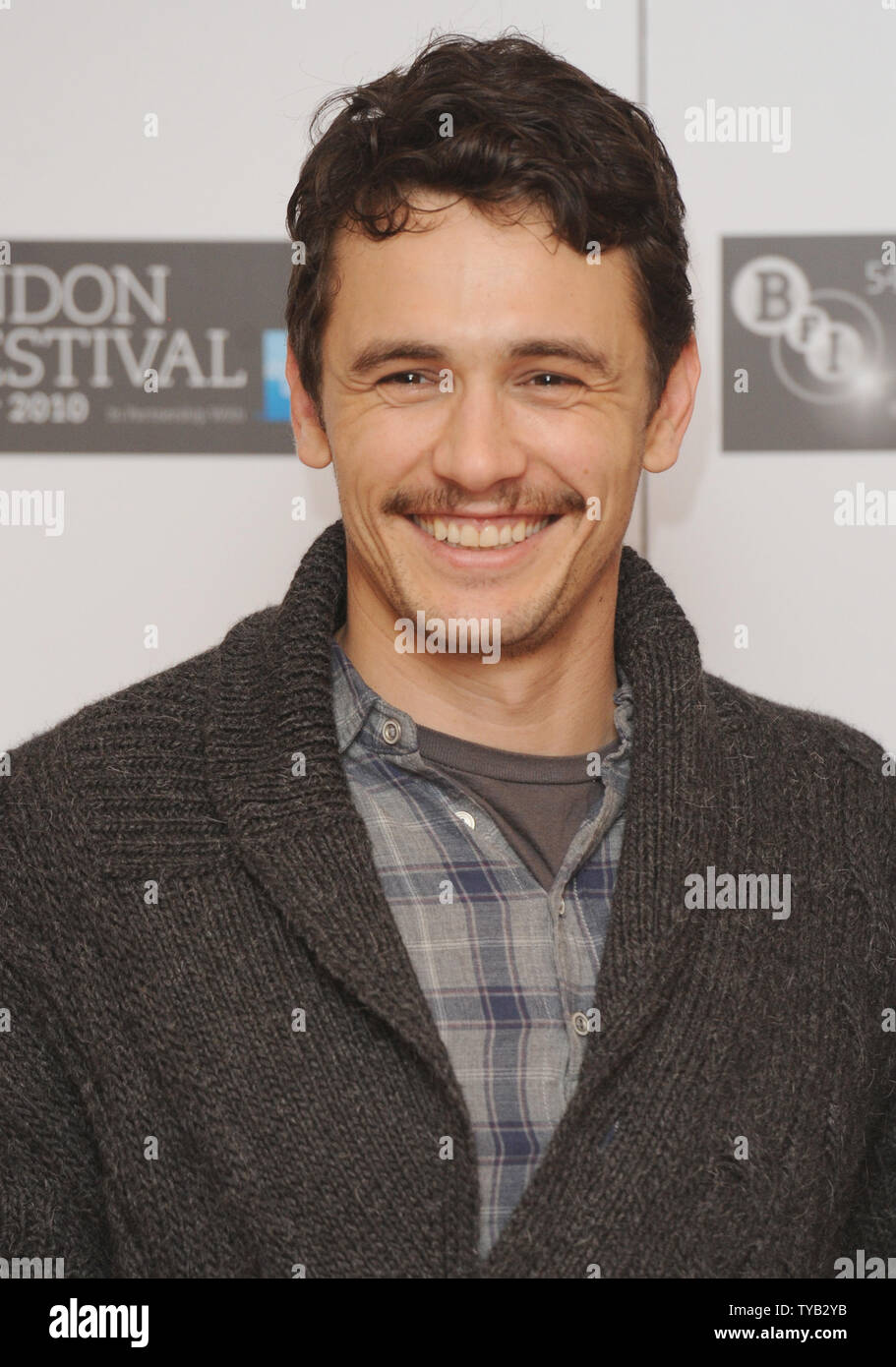 American actor James Franco attends a photo call for "127 Hours" at Vue ...