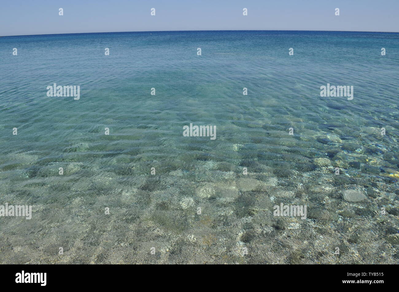 Crystal clear ocean of Karpathos, a small greece island in the aegean ...