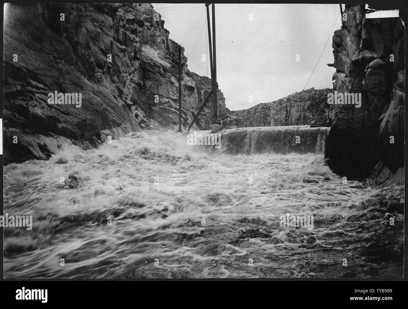 Pathfinder Dam; lower face during flood.; Scope and content: Photograph ...