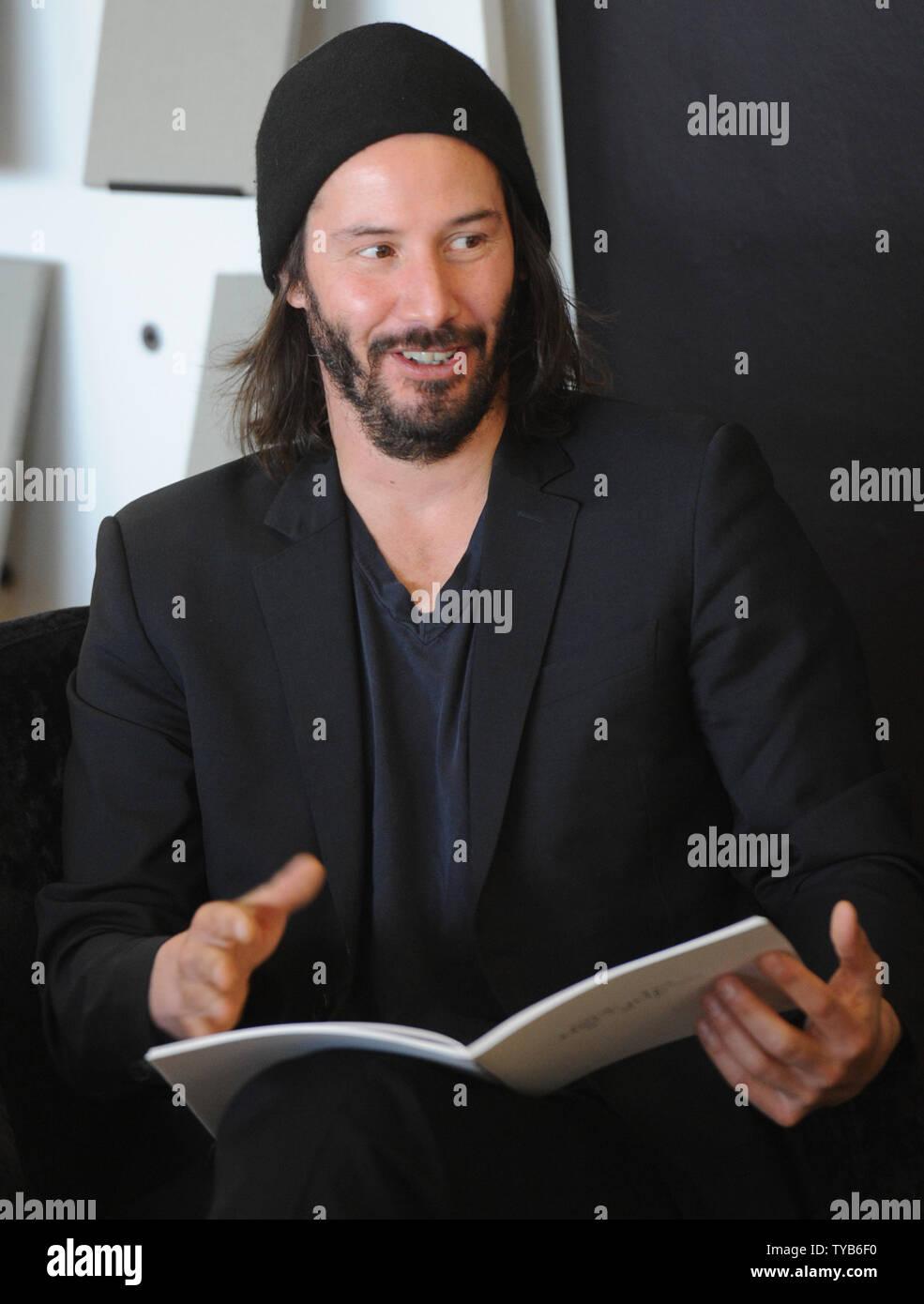 American actor Keanu Reeves attends a signing of his new book "Ode To ...
