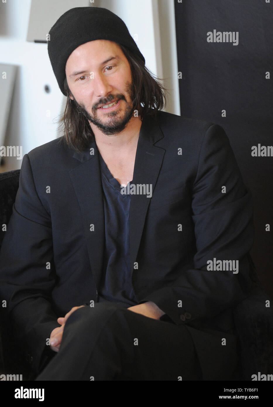 American actor Keanu Reeves attends a signing of his new book "Ode To ...