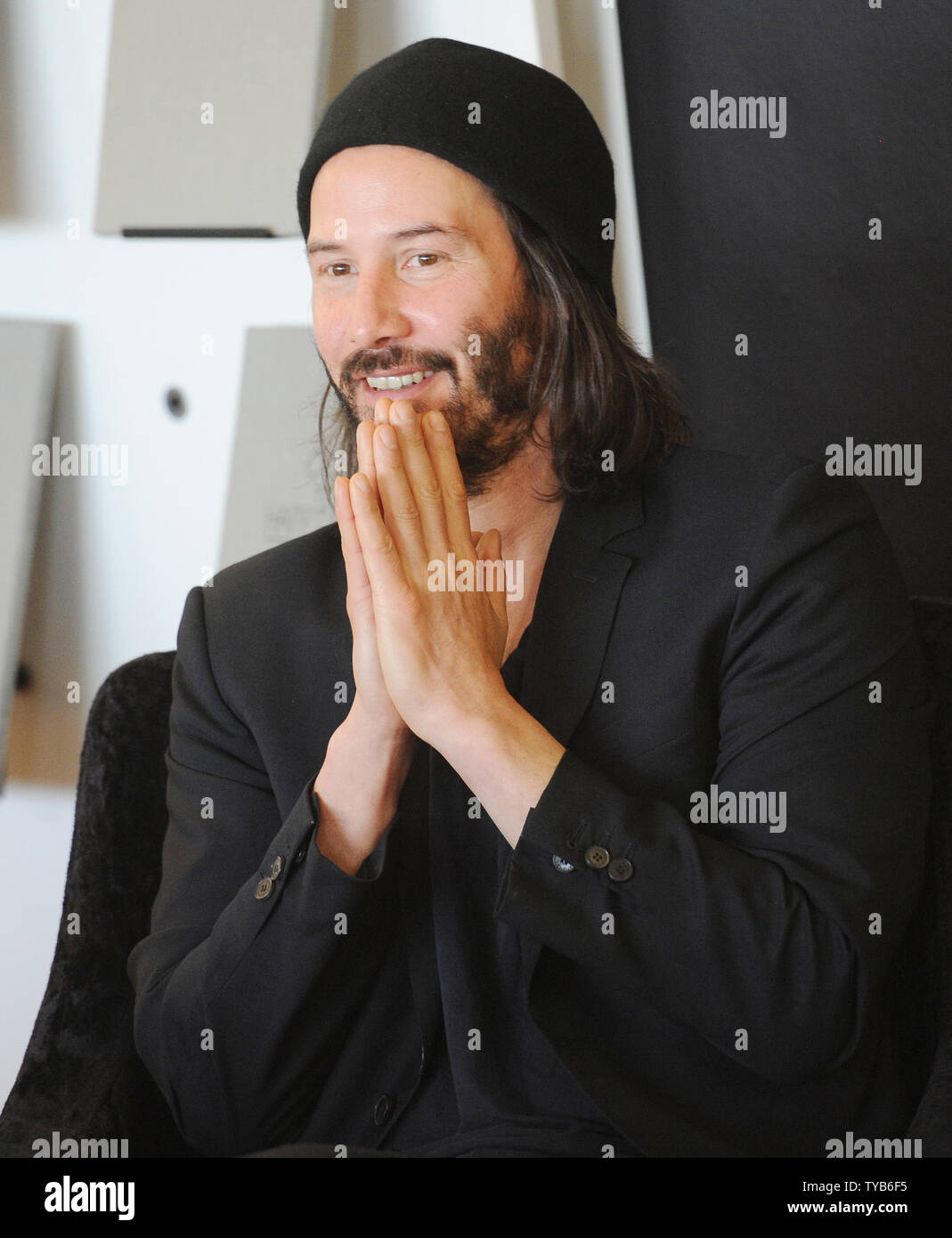 American actor Keanu Reeves attends a signing of his new book "Ode To ...