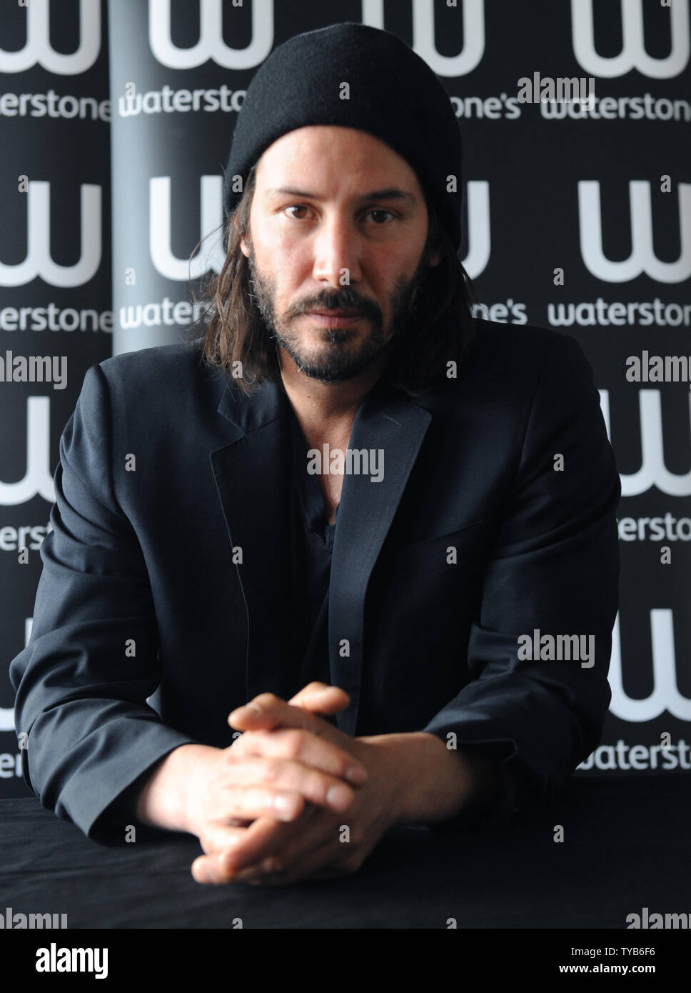 American actor Keanu Reeves attends a signing of his new book "Ode To ...