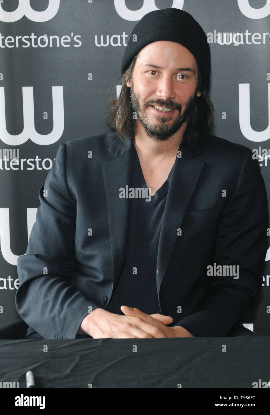 American actor Keanu Reeves attends a signing of his new book "Ode To ...