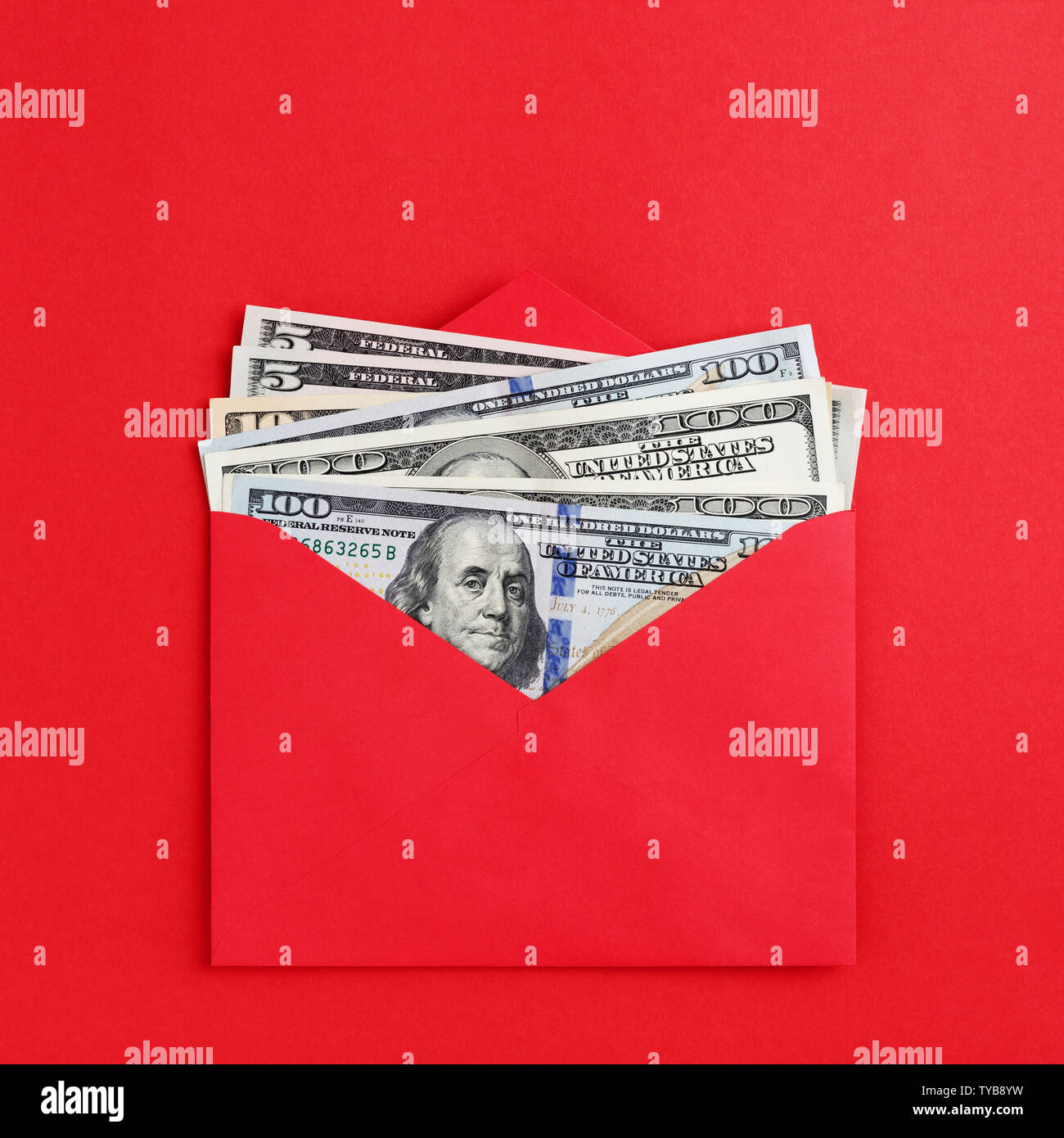 American dollars in cash in red envelope on bright minimal style ...