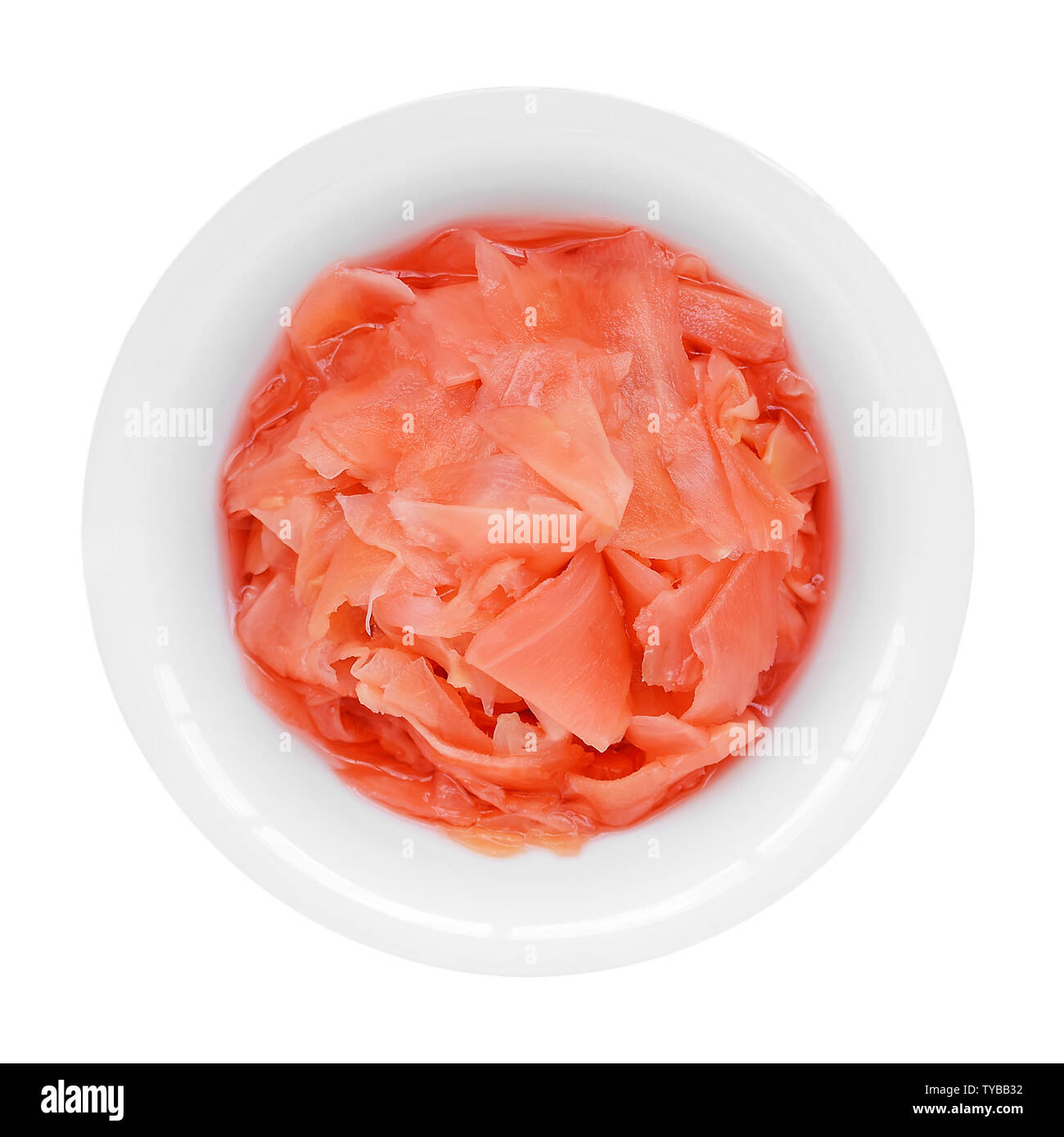 Pink pickled ginger in a white porcelain bowl isolated on a white ...