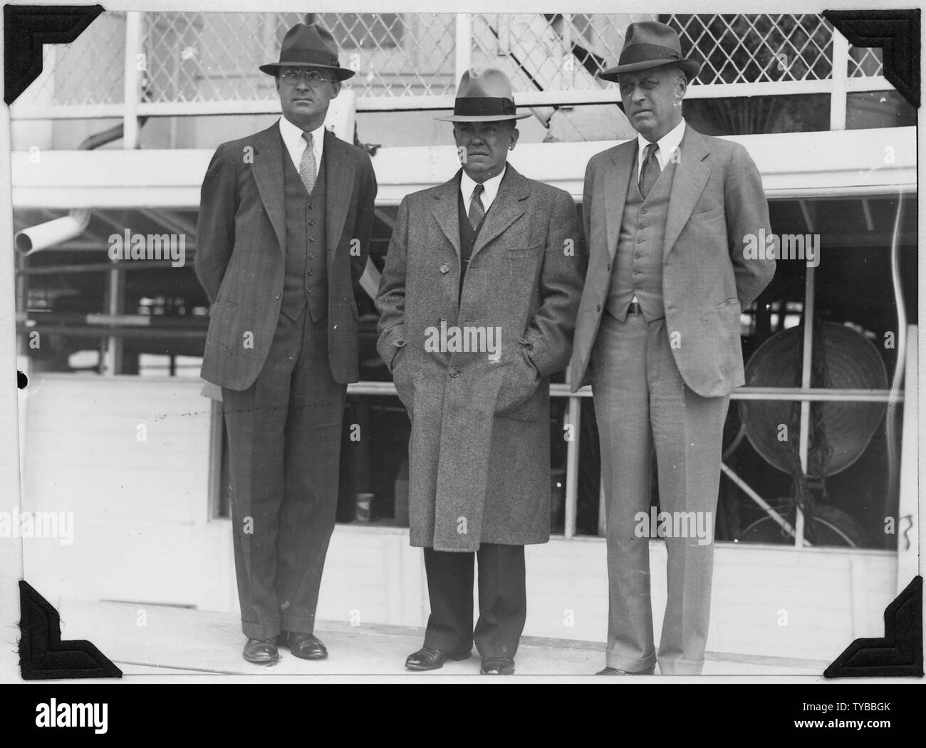 Photograph of 3 men in suits participating in the Alma, WI dam ...