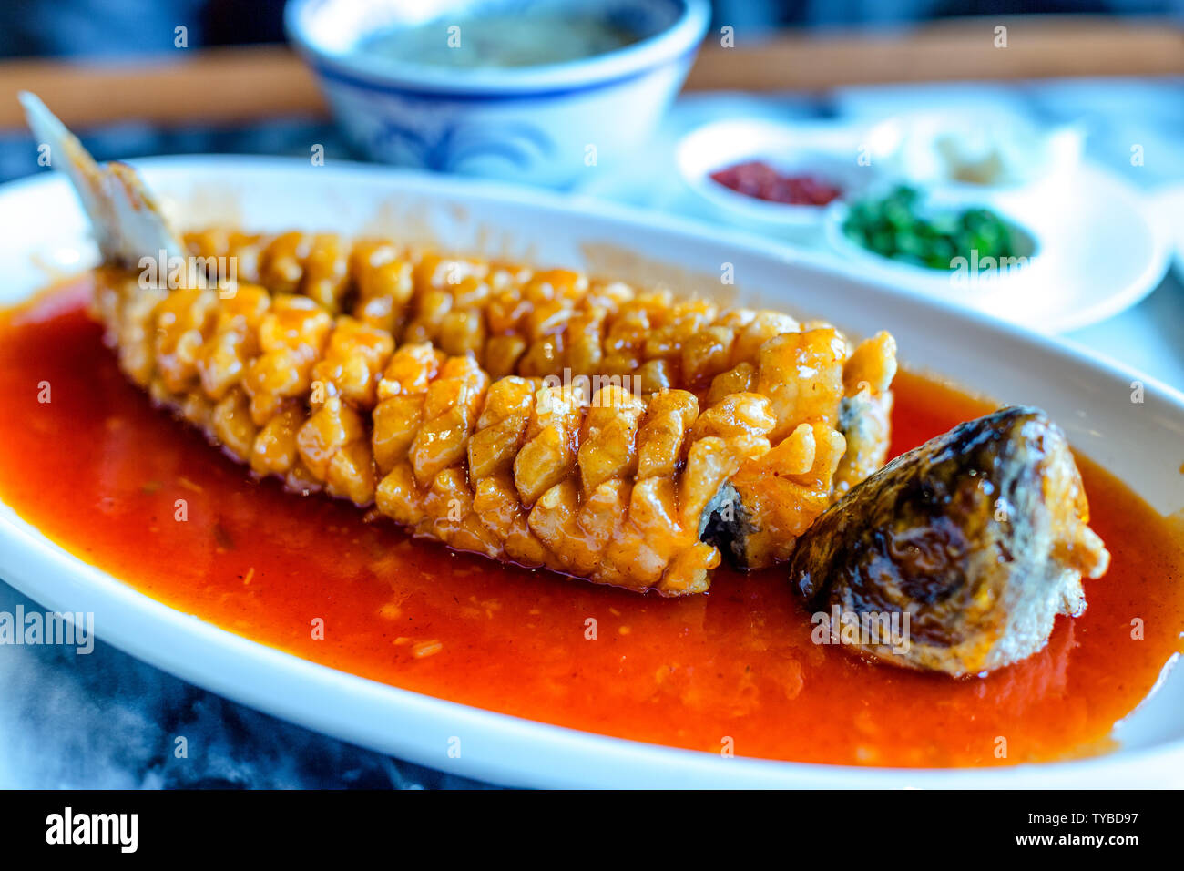 Delicious Chinese food on table Stock Photo - Alamy