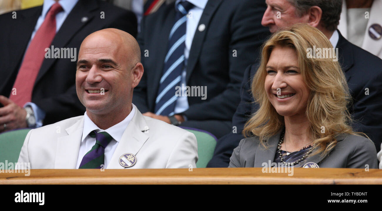 America's Andre Agassi and his wife Steffi enjoy the tennis in the ...