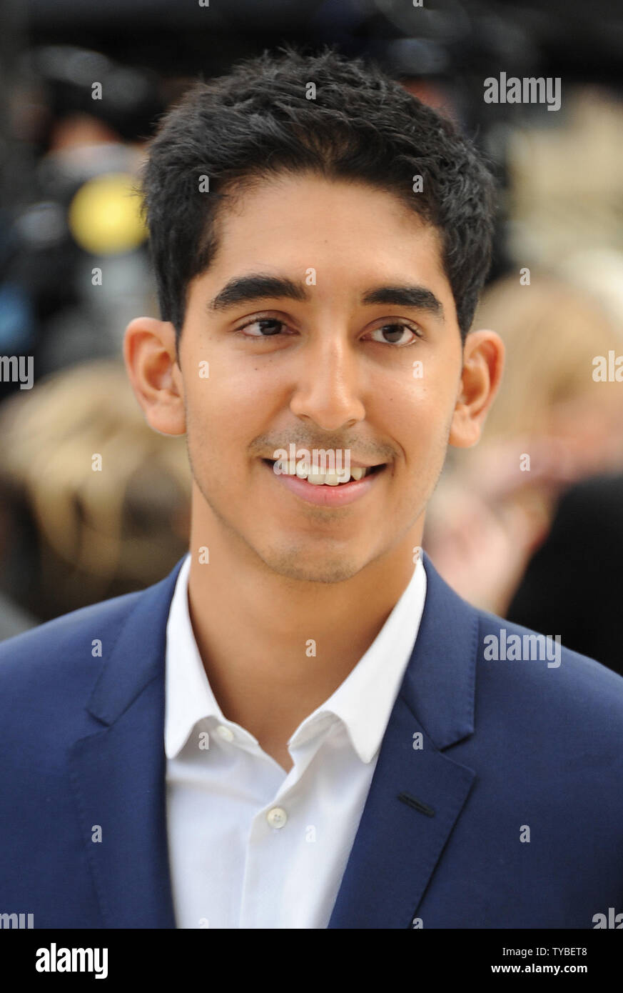 English actor Dev Patel attends The Burberry Prorsum Spring/Summer 2013 ...