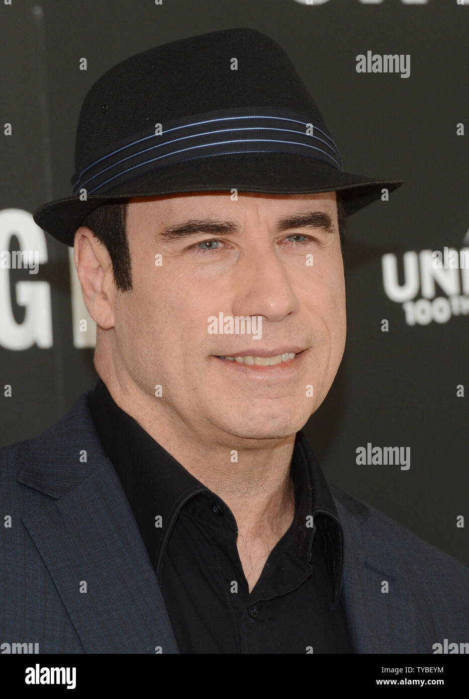 American actor John Travolta attends a photo call for "Savages" at ...