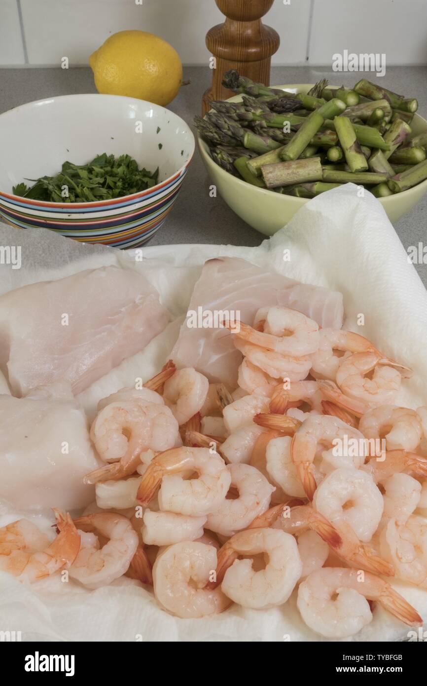 Stockholm, Sweden Dinner preparations with cod fish, shrimp and ...