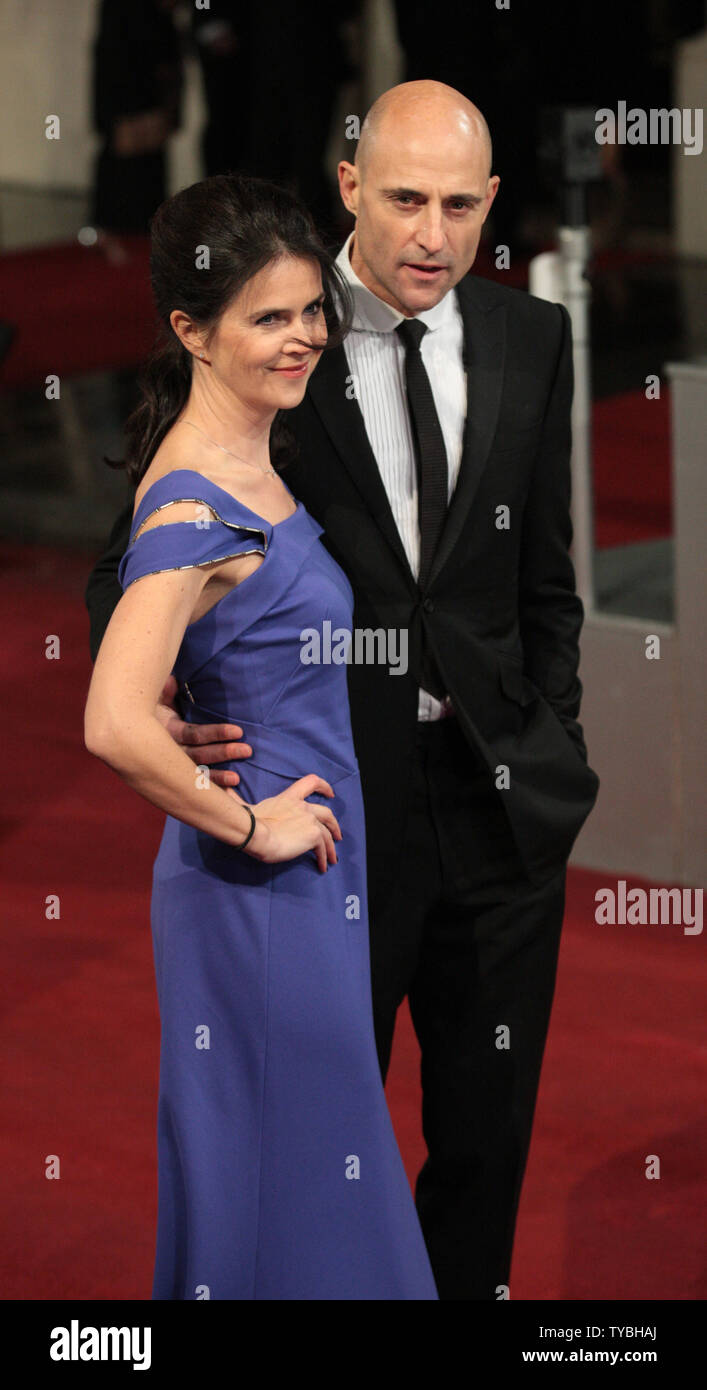 British actor Mark Strong and partner arrives at the Baftas Awards ...