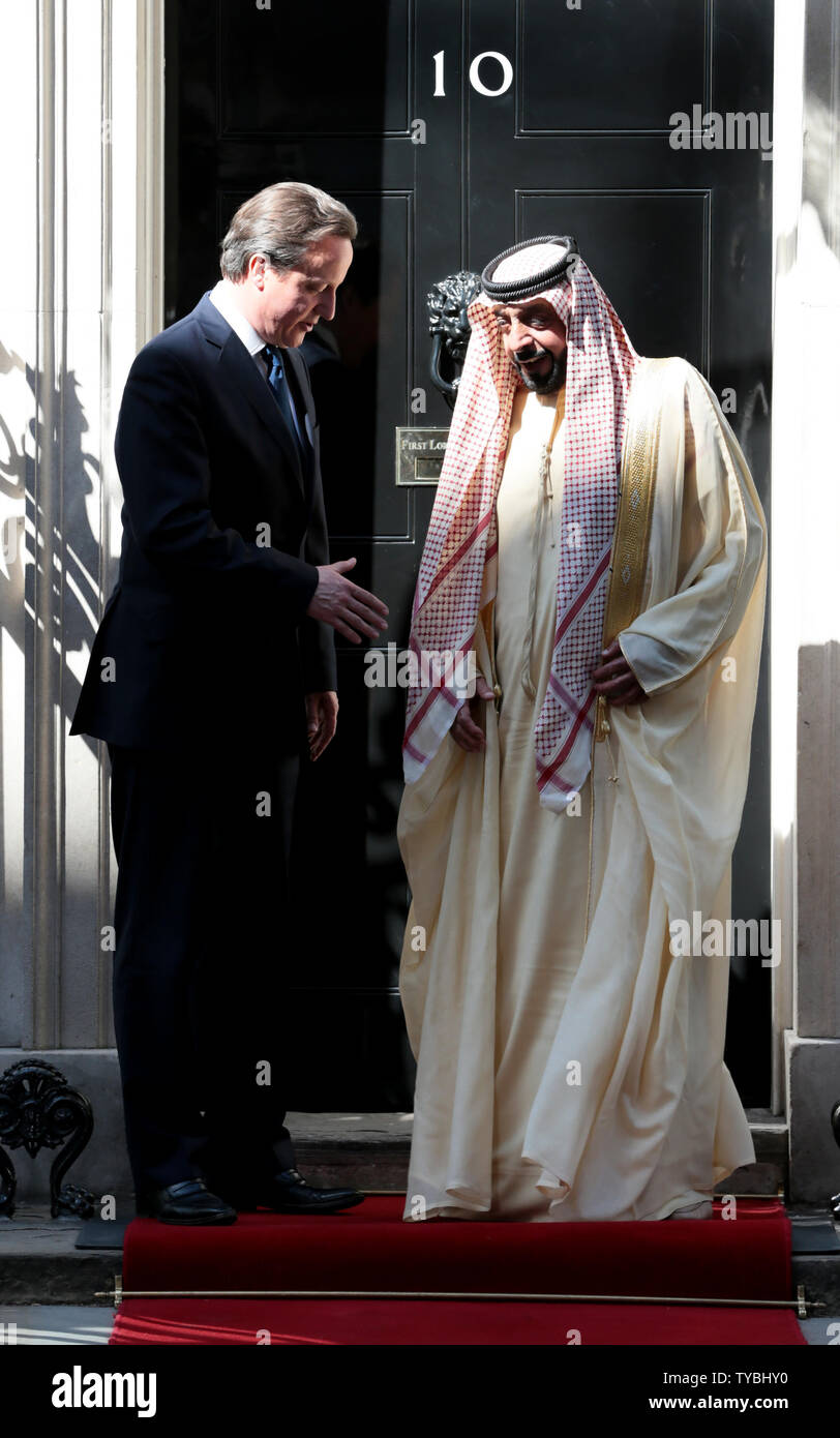 British Prime Minister David Cameron greets His Highness Khalifa bin ...